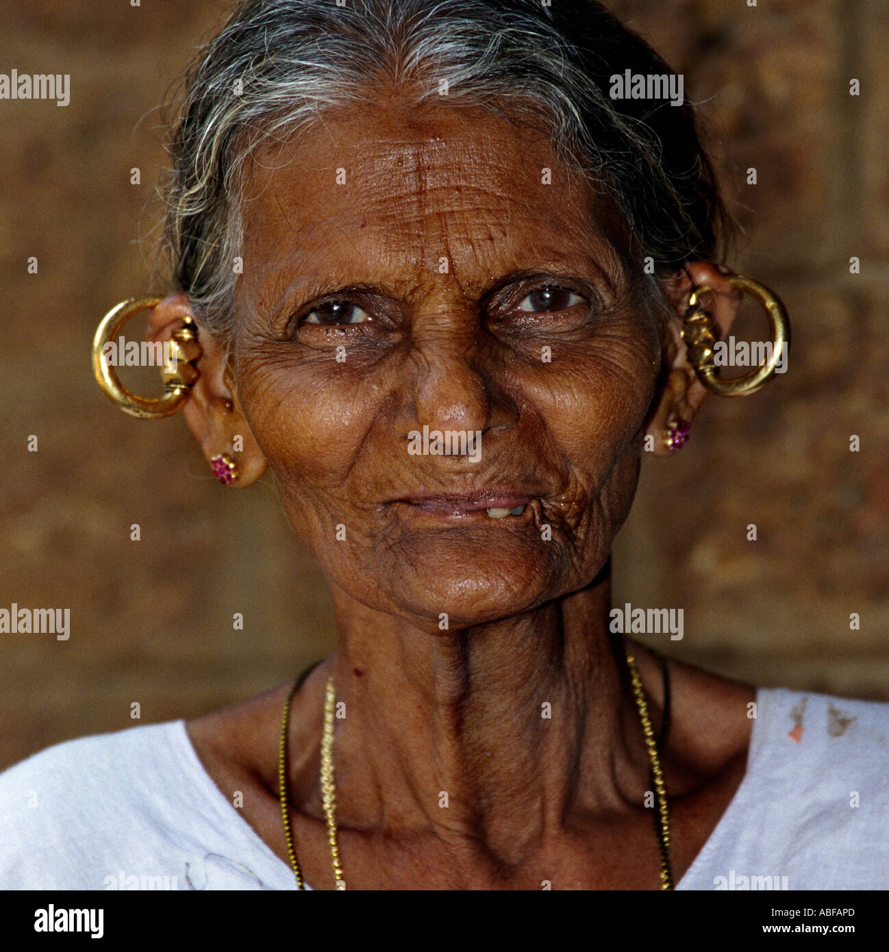 An Old Kerala Lady With Traditional Christian Costume And Ear Rings