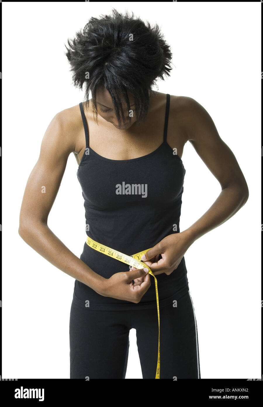 Close up of a young woman measuring her waist Stockfoto, Lizenzfreies ... Close up of a young woman measuring her waist Stockfoto, Lizenzfreies ...