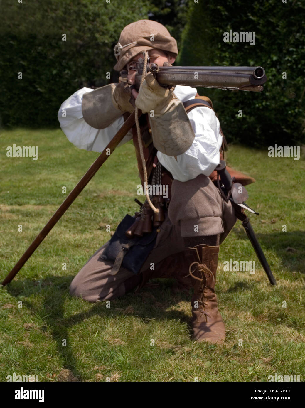 17th century Civil War Musketeer aiming his matchlock musket. Played ... 17th century Civil War Musketeer aiming his matchlock musket. Played ...