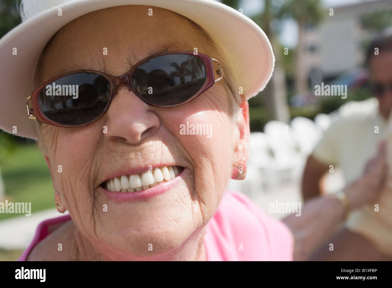 Portrait of a senior woman smiling Stock Photo, Royalty Free Image ... Portrait of a senior woman smiling Stock Photo, Royalty Free Image ...