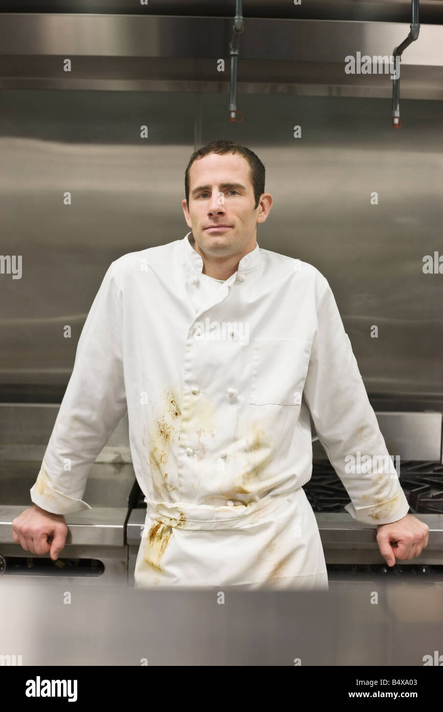 Dirty chef leaning against stove Stock Photo, Royalty Free Image: 20247587 - Alamy