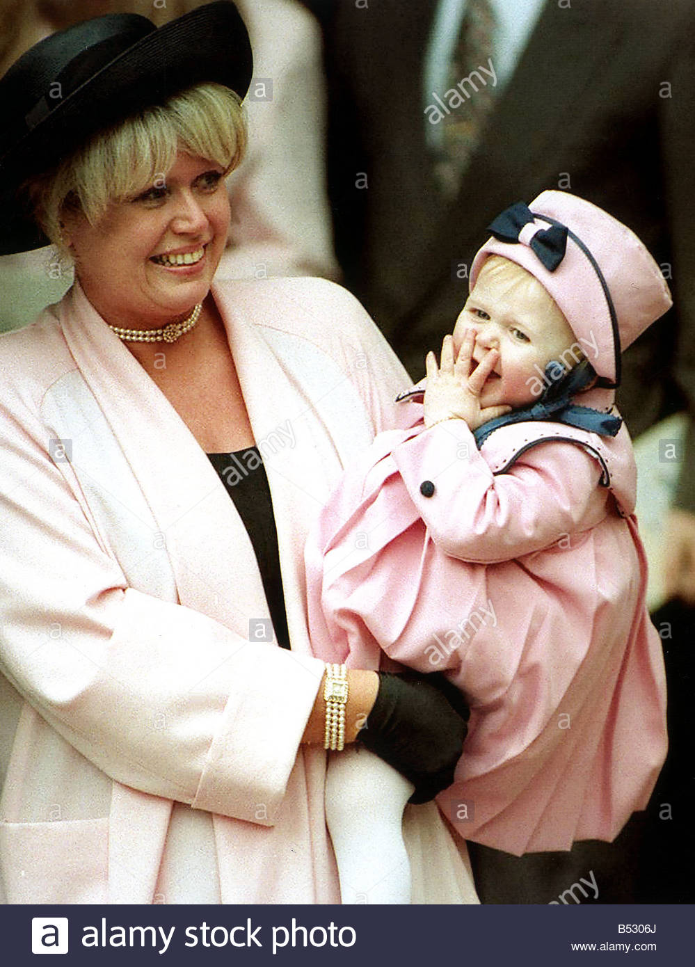 Tracy Dawson widow of Les Dawson carries their daughter Charlotte Stock ... Tracy Dawson widow of Les Dawson carries their daughter Charlotte Stock ...