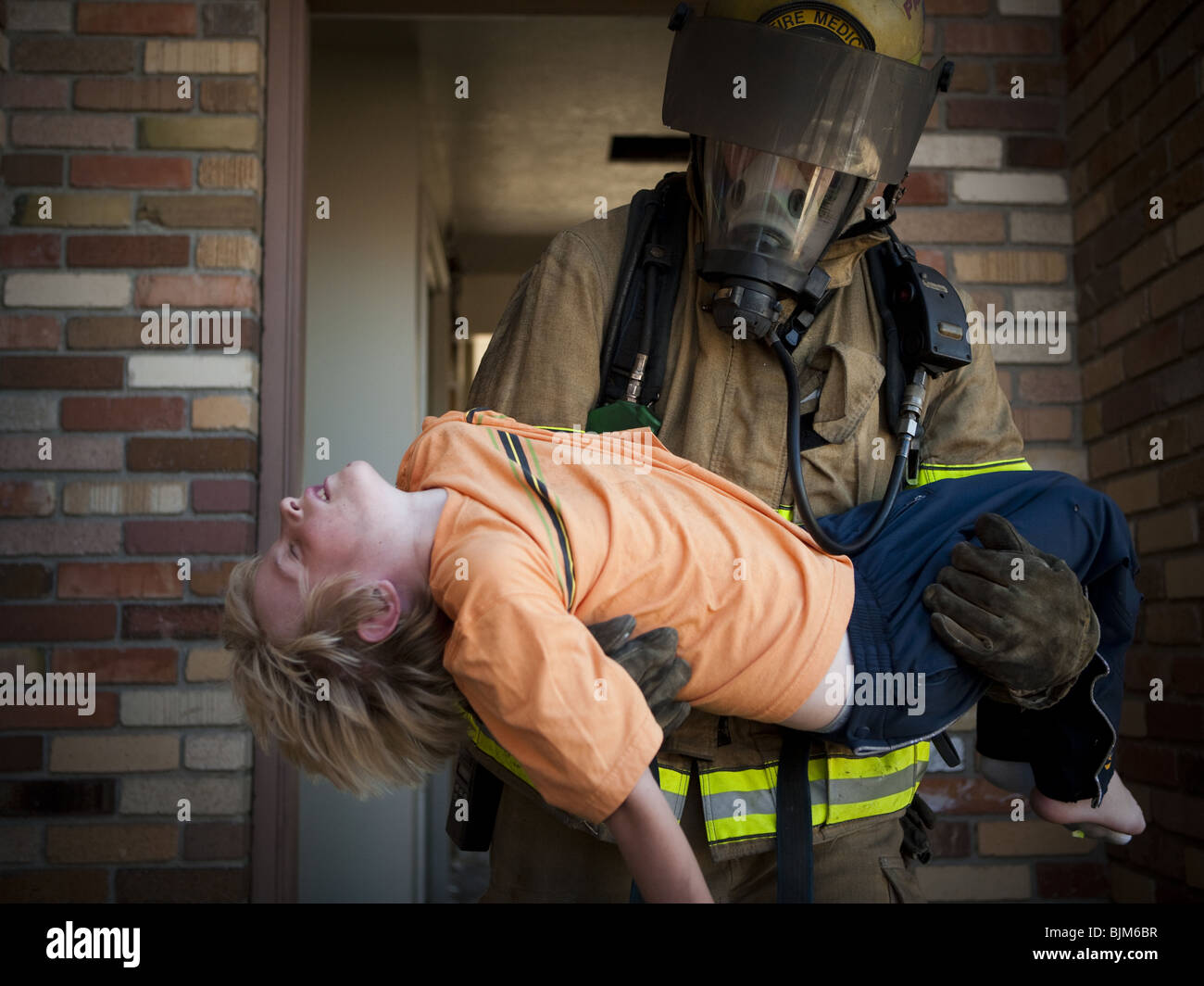 Fire fighter rescuing child Stock Photo, Royalty Free Image: 28718251 ... Fire fighter rescuing child Stock Photo, Royalty Free Image: 28718251 ...