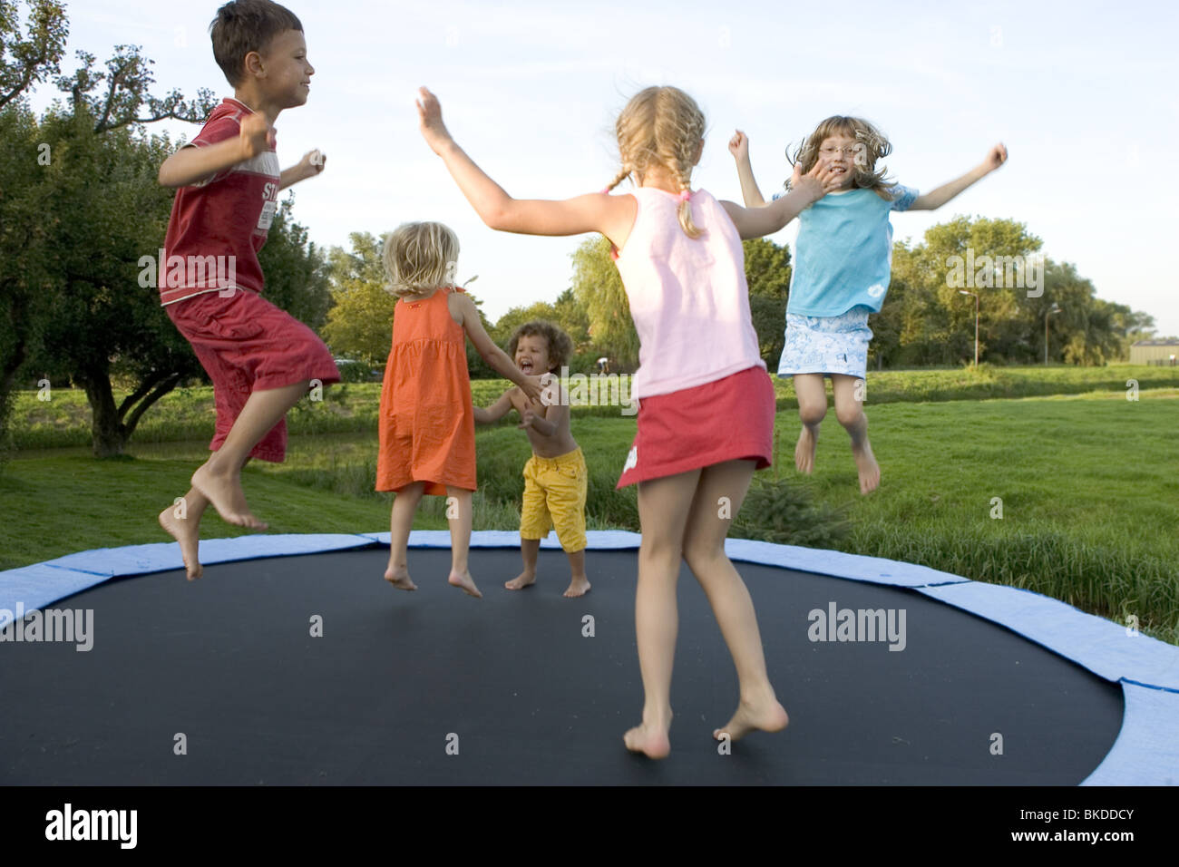 Children on trampoline Stock Photo, Royalty Free Image: 29184763 - Alamy Children on trampoline Stock Photo, Royalty Free Image: 29184763 - Alamy