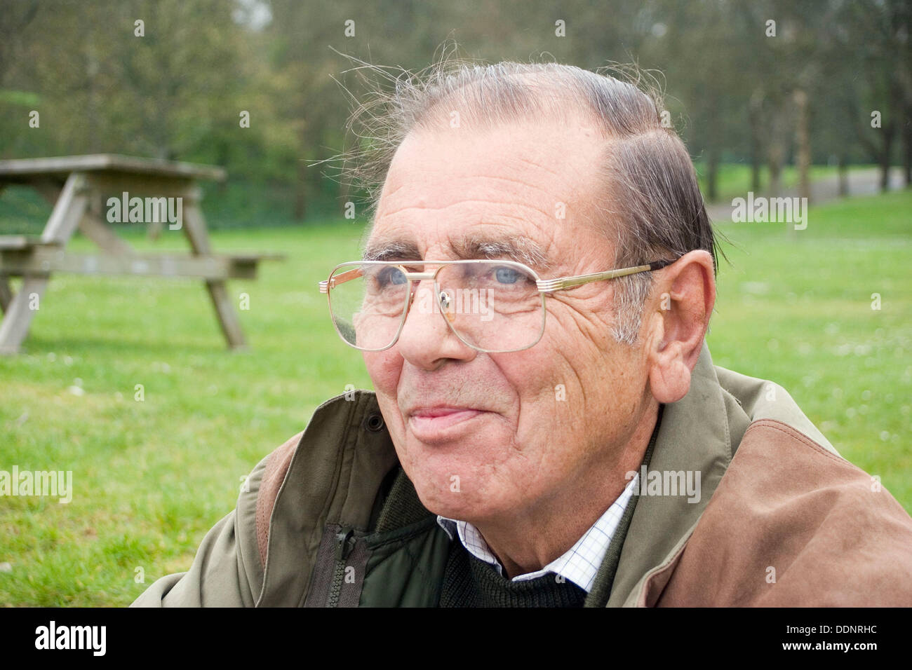 75 Year Old Man Smiling Off Camera Headshot Stock Photo Royalty Free
