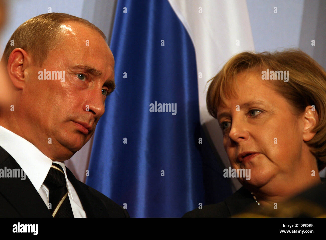 Vladimir Putin and German Chancellor Angela Merkel appeared in Stock ... Vladimir Putin and German Chancellor Angela Merkel appeared in Stock ...