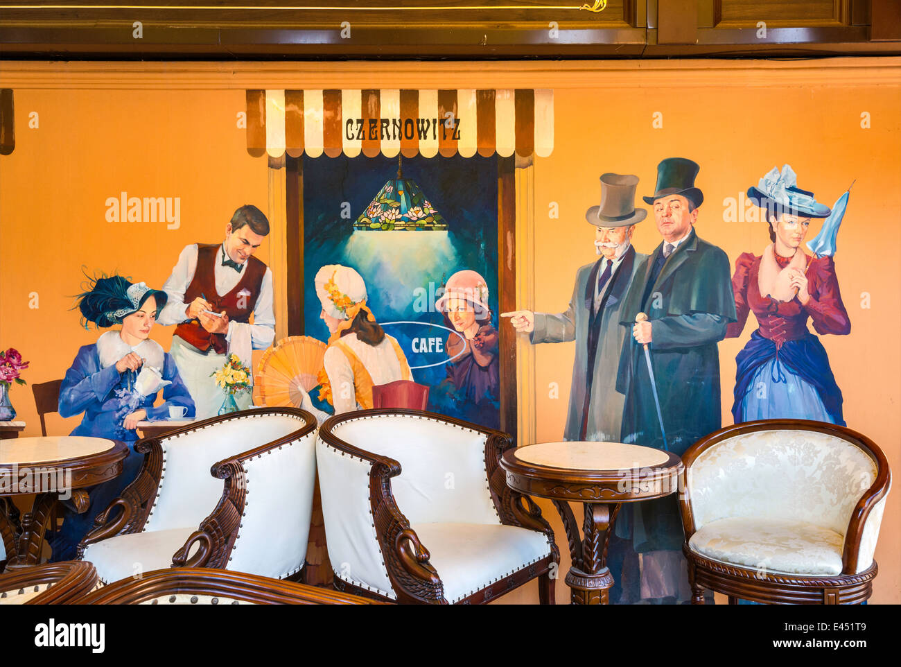 Murals showing late 19th century customers at historic Grand Cafe Stock ...