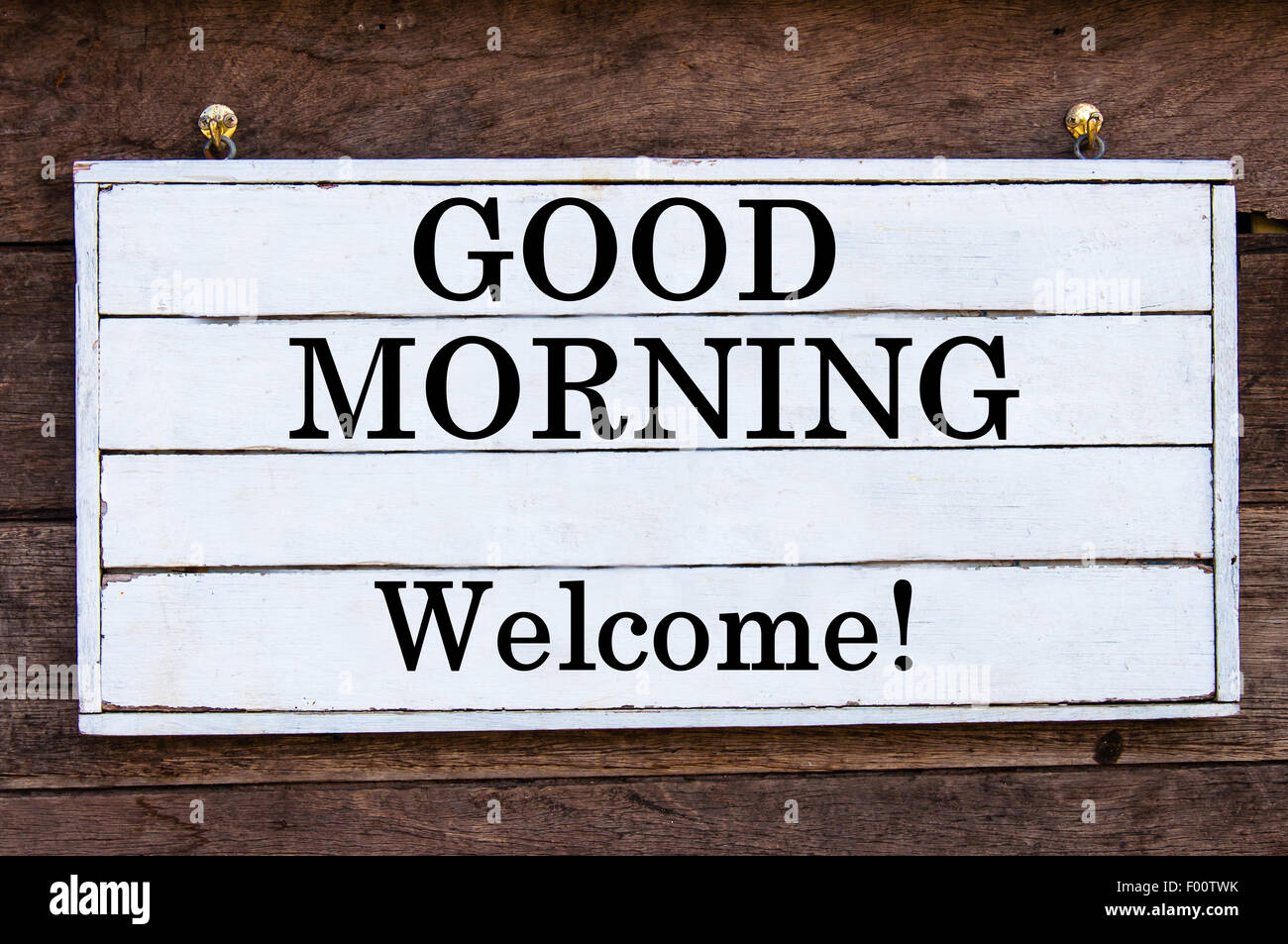 Good Morning, Welcome Inspirational message written on vintage wooden ...