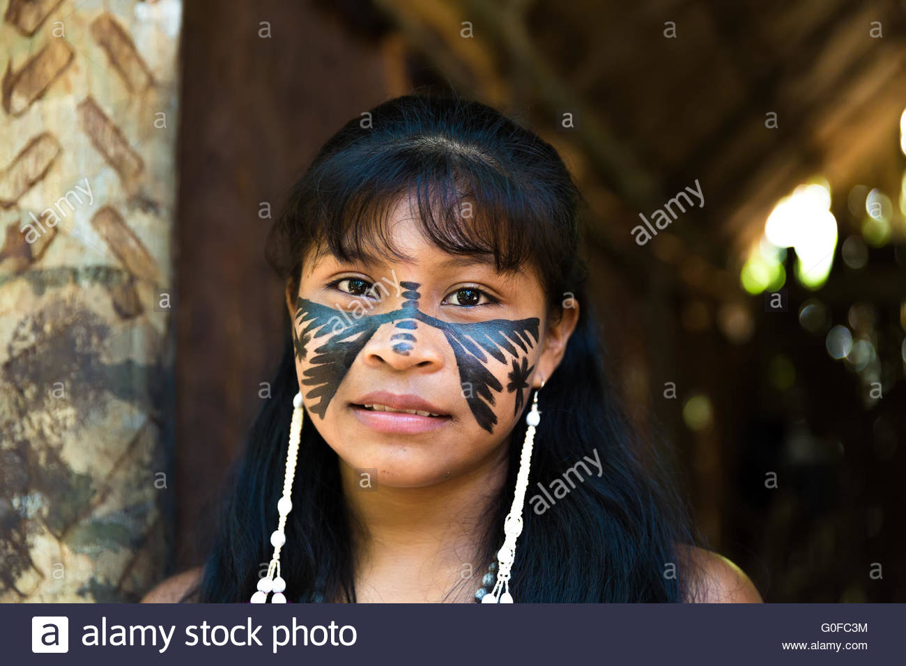 Native Brazilian Girl Smiling At An Indigenous Tribe In The Amazon