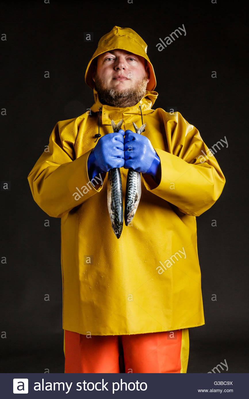 Man dressed as a commercial fisherman, wearing traditional protective ...