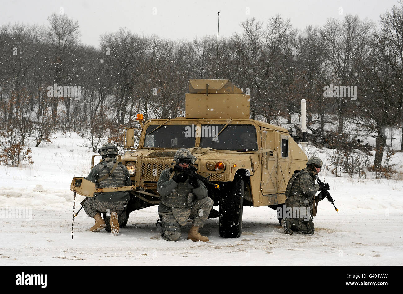U.S. soldiers take cover behind a humvee during Combat Support Stock ... U.S. soldiers take cover behind a humvee during Combat Support Stock ...