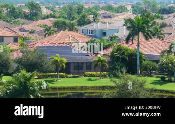 Residential house in USA with rooftop covered with solar photovoltaic ...