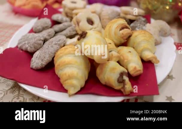An exquisite variety of delightful pastry treats is beautifully ...