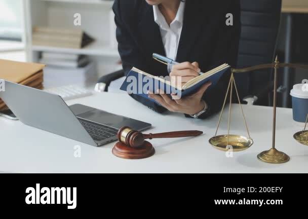 businessman or lawyer lawyer working with laptop and documents and ...