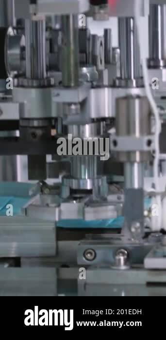 Face mask production line in modern factory . Concept of covid-19 ...