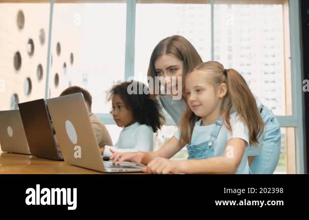 Smart student celebrate successful project while teacher looking at ...