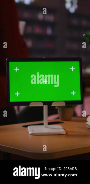 Vertical Video African american pupil immersed in essay writing next to ...