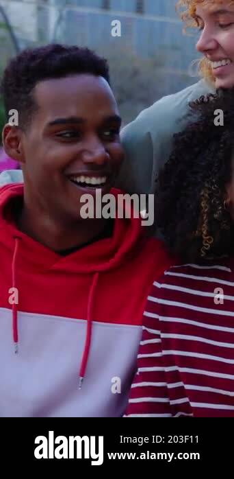 Vertical HD video of young happy group of Gen Z friends having fun ...