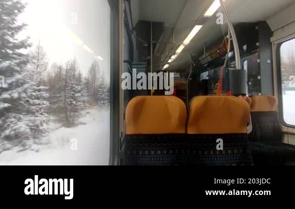 poprad, Slovakia - December 16, 2024: . View from inside the carrriage ...