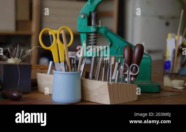 No people shot of container with scissors and tools, wooden tool holder ...