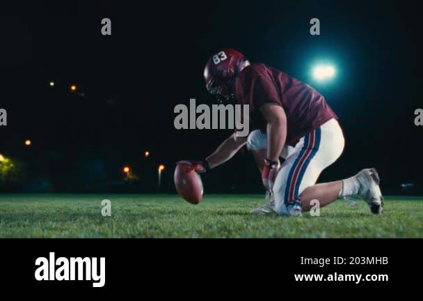 Cinematic shot of American Football player Kickoff Game Start. Static ...
