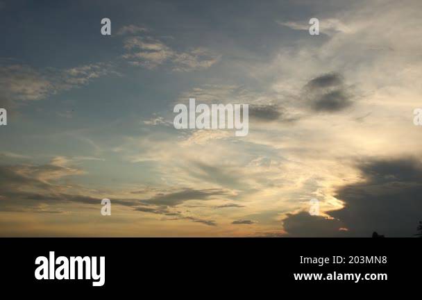 Clear blue sky with cumulus clouds that stand still and cirrus clouds ...