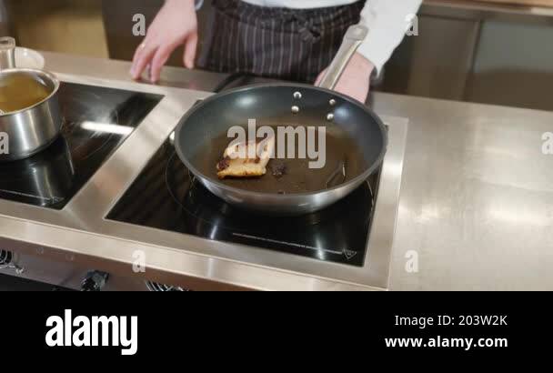 Chef Cook Prepares Delicious Fish Dish at Restaurant. Slow motion 60fps ...