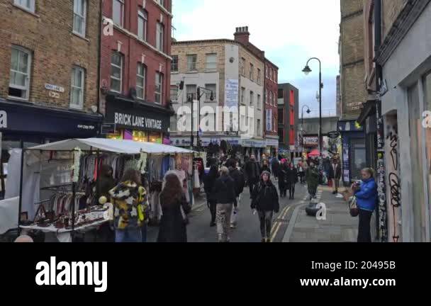 Brick Lane in London showcases a vibrant street market with diverse ...