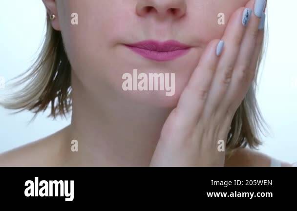 Woman with toothache taking out a tooth from mouth, losing teeth ...
