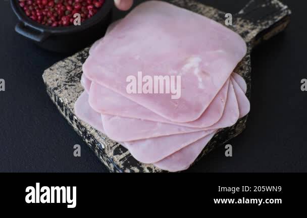 Ham cut into square slices for making delicious nutritious sandwiches ...