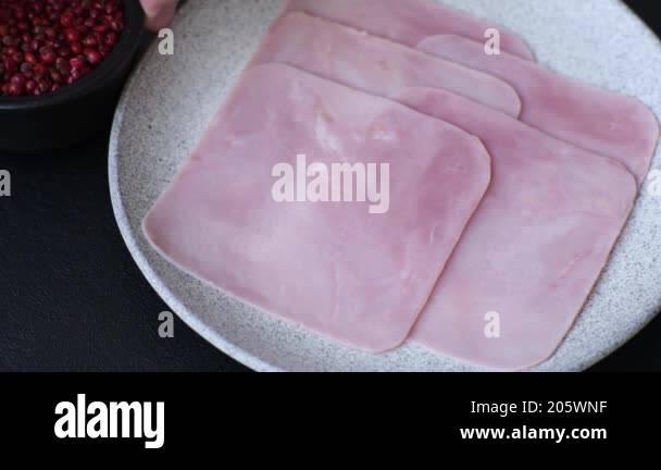 Ham cut into square slices for making delicious nutritious sandwiches ...