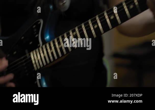 A band playing musical instruments on stage Stock Video Footage - Alamy