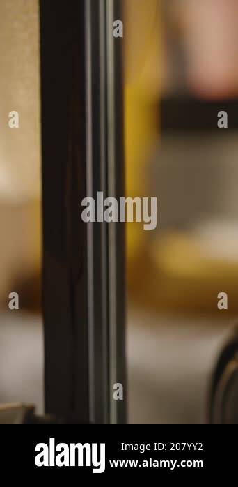 Vertical video. Steam fogs up a mirror from a boiling kettle ...