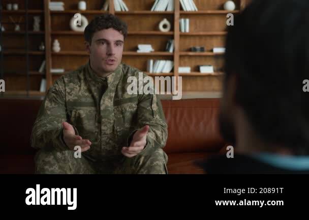 Worried nervous Caucasian male officer veteran army military soldier man guy in combat ...