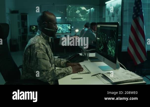 Medium side shot of African American male military officer in ...