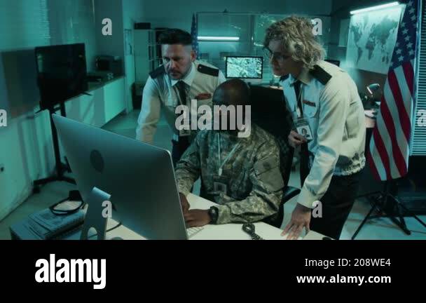 Medium zoom-in shot of multiethnic male and female officers in uniform ...