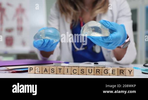 A professional explains silicone implants in detail during a ...