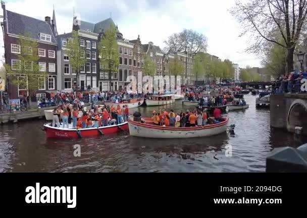 Amsterdam, Netherlands - April 27, 2024: Locals celebrating Kingsday in ...