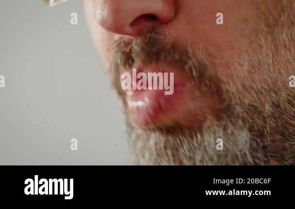 Man eating dumplings with fork. Male chewing food during close-up ...