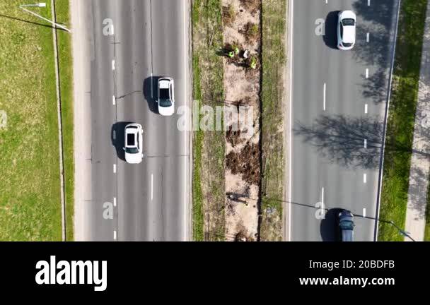 Aerial view of a divided highway with cars traveling in both directions ...