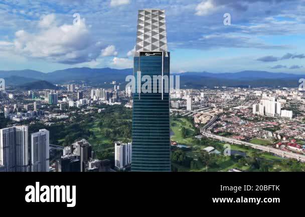 Close-up aerial view of Menara Exchange 106 building with blue sky ...