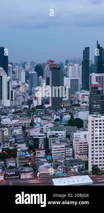 Day and night transition time lapse of cityscape and buildings in ...