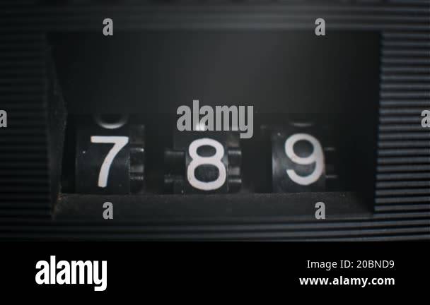 Close-up of a vintage counter as its numbers ascend from 782 to 819 ...