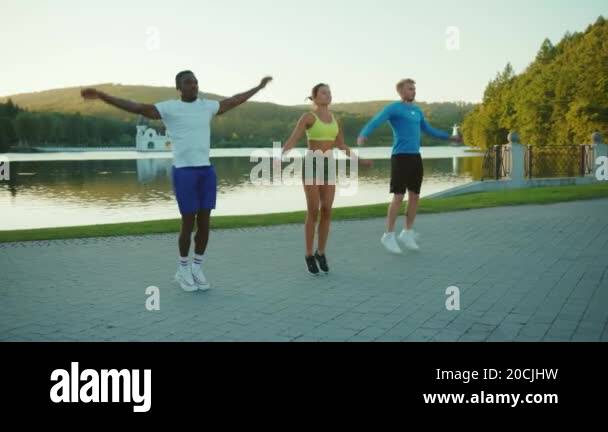 Fitness trio. Team sports. Healthy-looking attractive well-trained ...