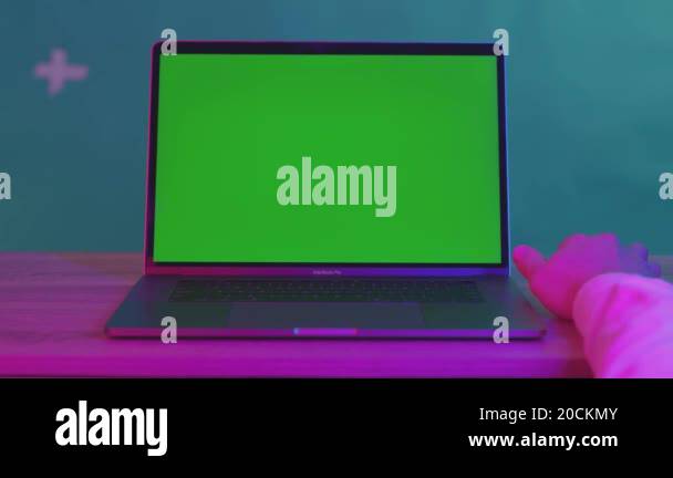 NEW YORK - April 5, 2018: Close-up anxious young man typing on laptop ...