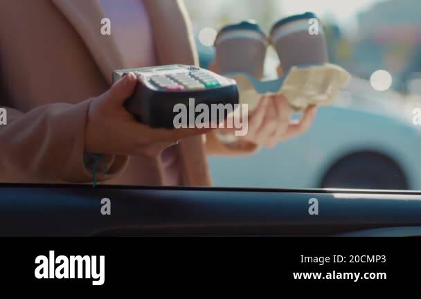 NEW YORK - April 5, 2019: At sunlight close up hands woman making ...