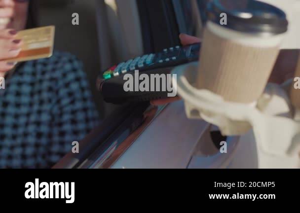 NEW YORK - April 5, 2019: Close up hands woman making payment ...