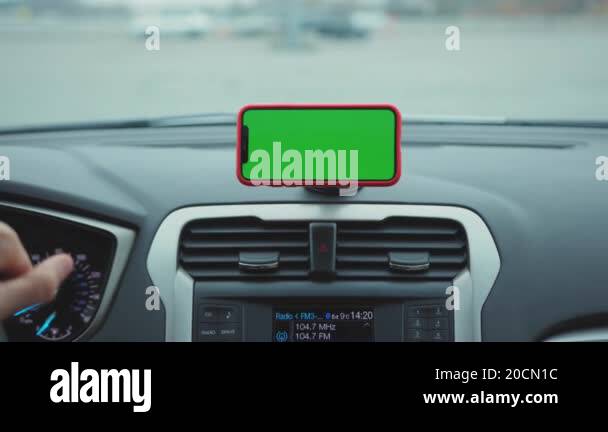 NEW YORK - April 5, 2019: Hands man drive car smartphone with ...