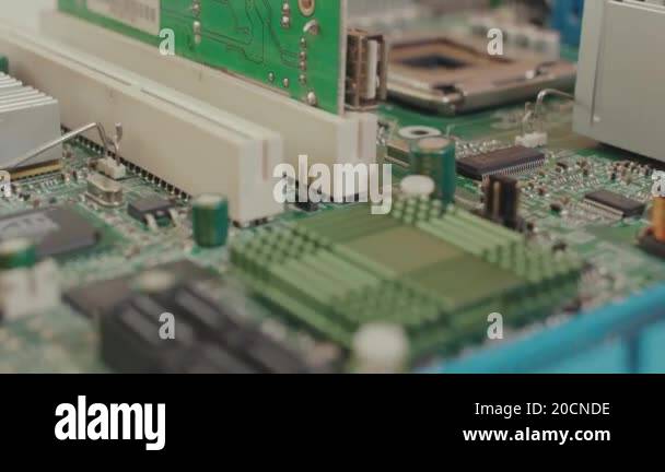 Electronic Pc Motherboard Close Up Macro Shot On Computer Electric Circuit Chip Board With