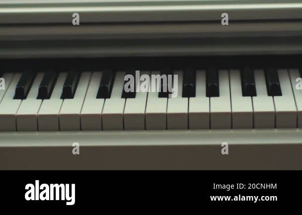 Art and music. Beautiful vintage white piano keyboard with white and ...